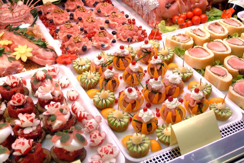 A Showcase of a Delicatessen with Ready-made Snacks of Meat, Fruit and ...