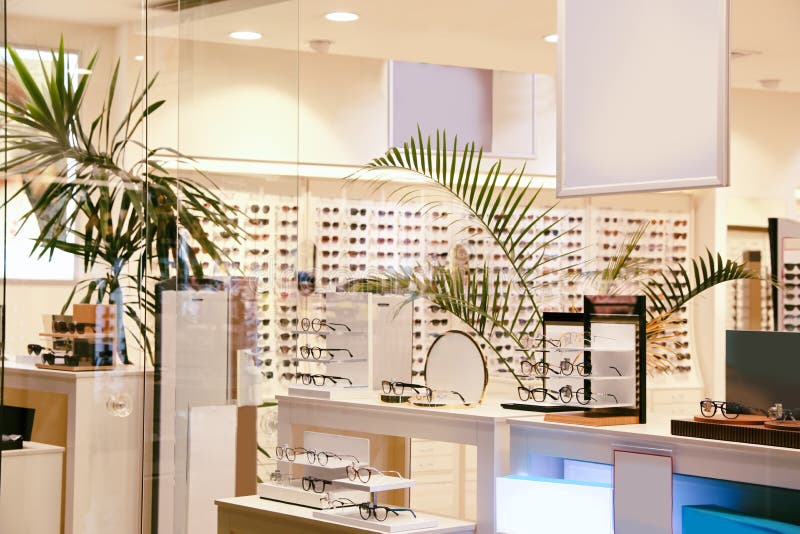 Showcase with Different Glasses in Optical Store Stock Photo - Image of ...