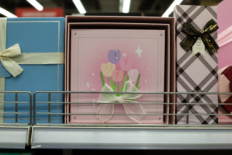 Showcase with Gift Boxes. Shelf in the Store with Cardboard Packaging ...