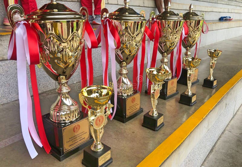 Showcase of Golden Plated Trophy for Prize Presentation on the Podium ...