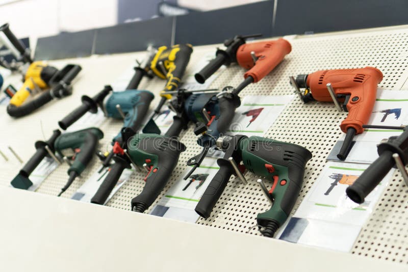 Showcase with Power Tool Drills in Hardware Store Stock Photo - Image ...