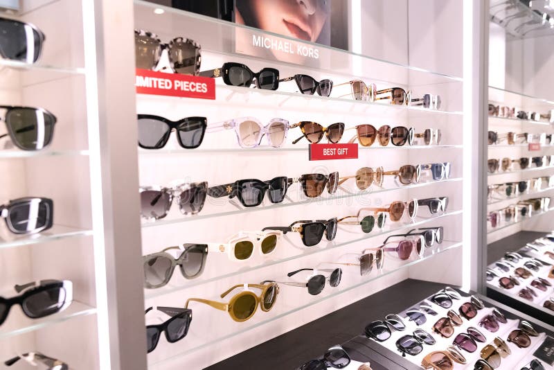 Showcase with Stylish Sunglasses in an Optical Store Editorial ...