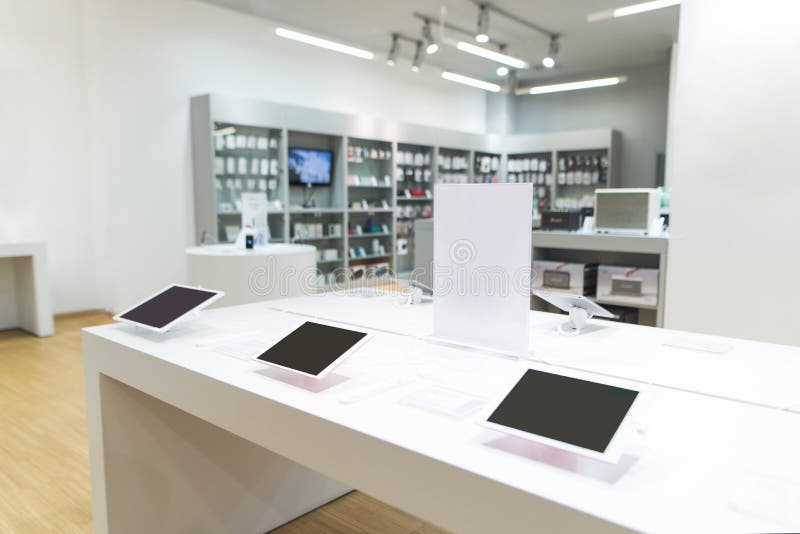 Showcase with Tablets in the Light Modern Tech Store. Tablets on a ...