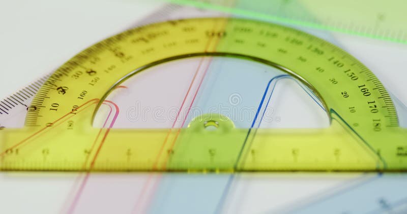 Showcases a Set of Protractors Laid Out on a Table Stock Video - Video ...