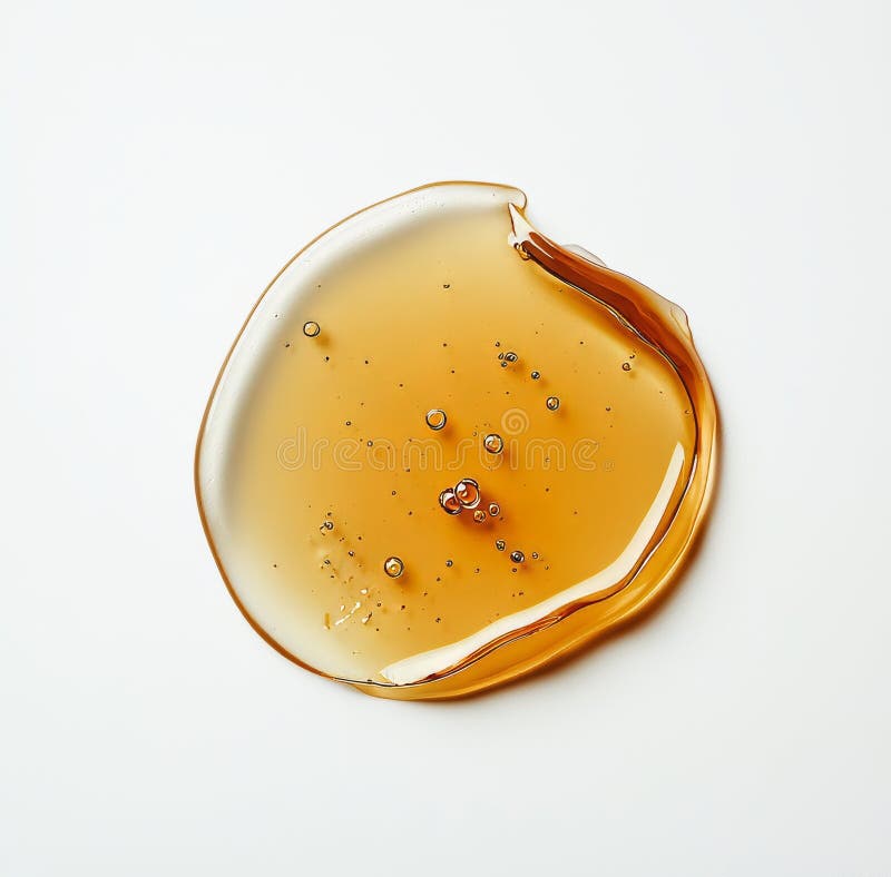 It Showcases Texture and Viscosity with a Golden Drop of Liquid ...