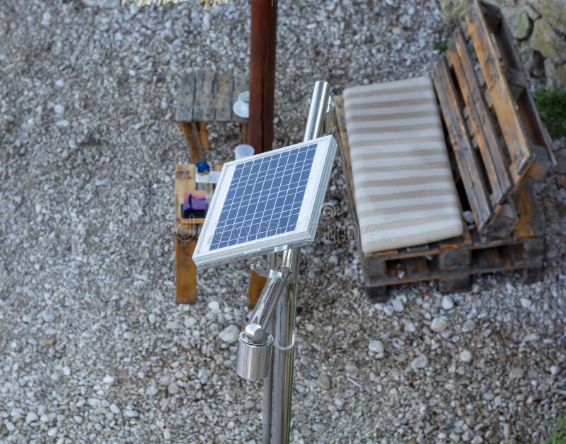 Shower on the Beach Powered with Solar Panel. Photovoltaic Panel on the ...
