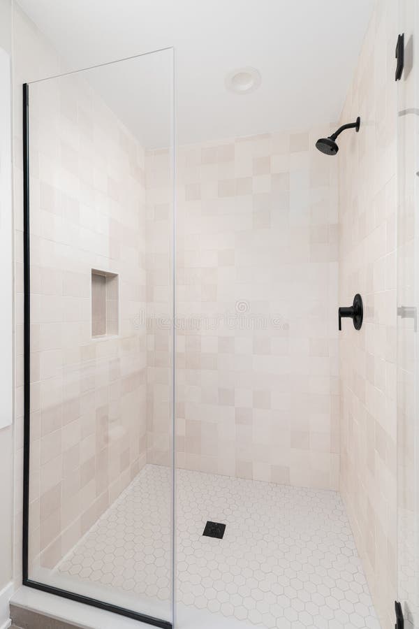 A Shower with Brown Square and White Hexagon Tiles. Stock Image - Image ...