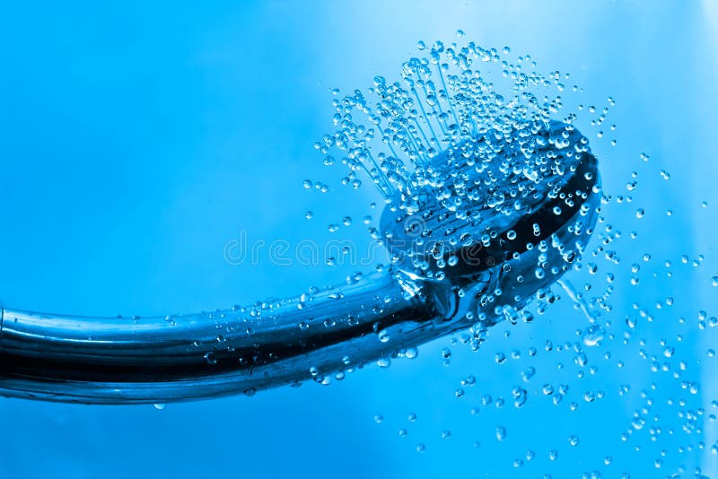 Shower Fresh and Drops and Sprays Water on a Blue Stock Photo - Image ...