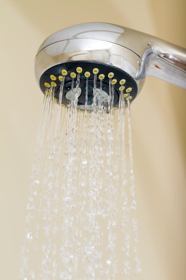 Shower head spraying water stock photo. Image of bath - 4954324