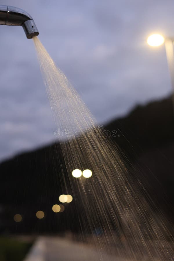 Shower Head is Spraying Water in the Air Stock Photo - Image of surface ...