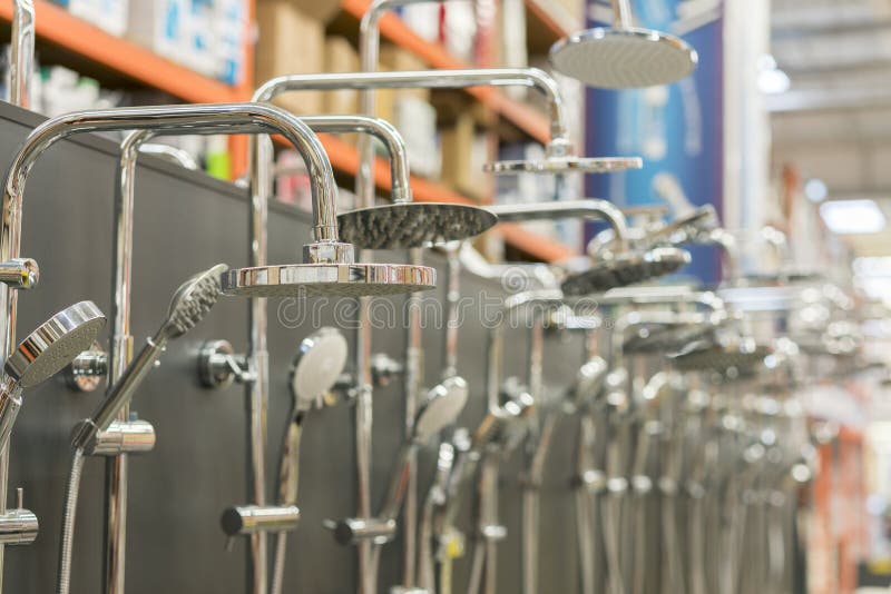 Shower Head on the Stand in a Hardware Store. Selected Focus. Set of ...