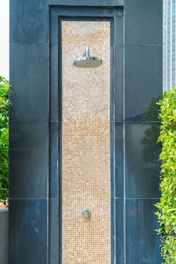 Shower at swimming pool . stock photo. Image of health - 77108480