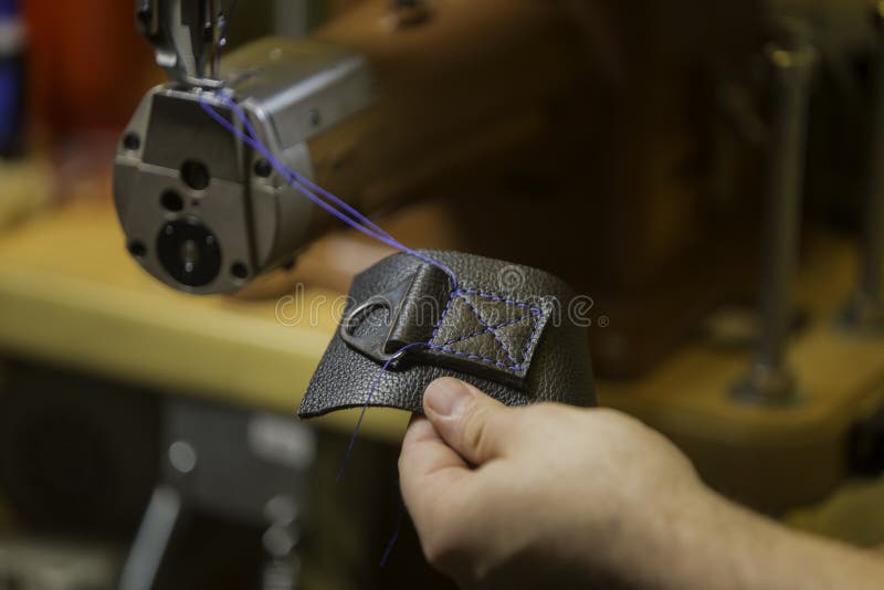 Showing a Box Stitch on Black Leather Stock Photo - Image of blue ...