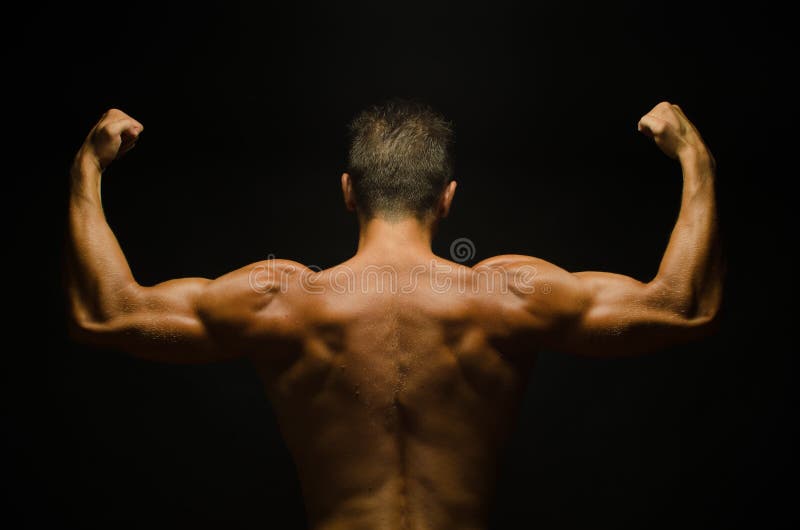 Showing muscles stock photo. Image of athlete, sport - 27894210