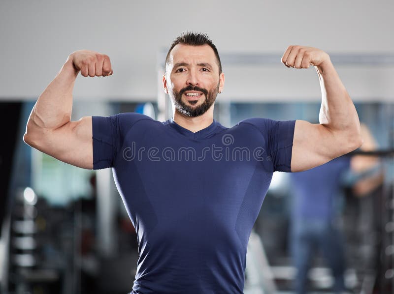 Showing off big arms stock image. Image of exercise, caucasian - 71428013