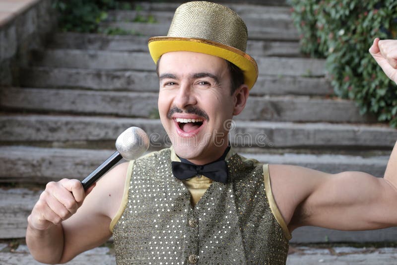 Showman with Golden Outfit Holding Microphone Stock Photo - Image of ...