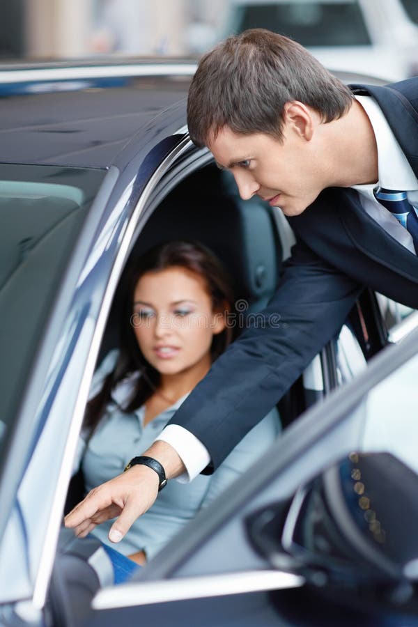 Valet Boy Holding a Car Key Stock Photo - Image of dealership, metal ...