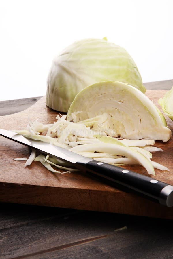 Shredded Cabbage, White Cabbage, Red Cabbage and Savoy on Cutting Board ...
