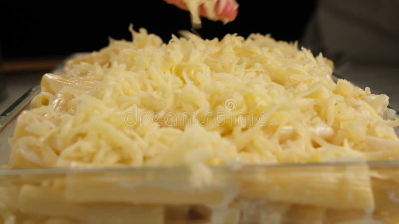 Shredded cheddar cheese stock footage. Video of slowmotion - 262862864