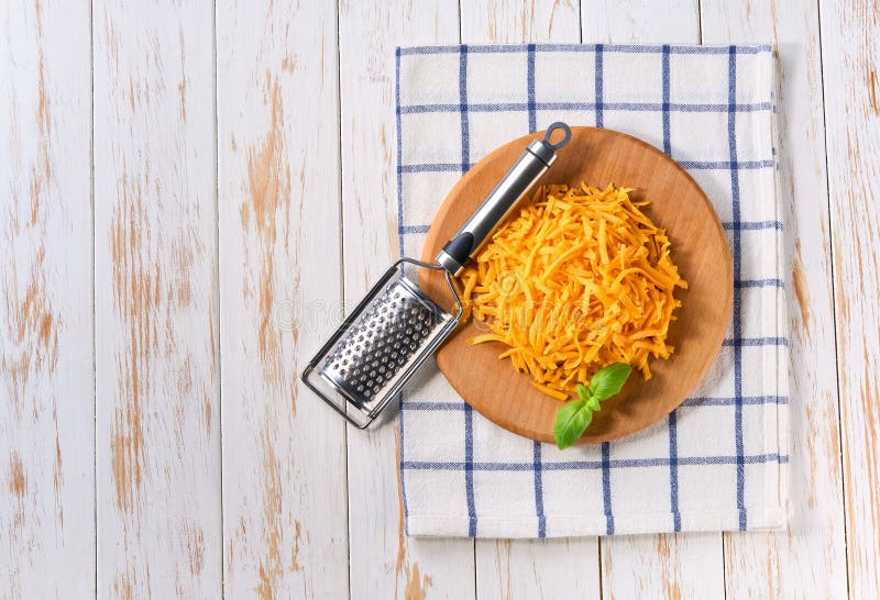 Shredded Cheddar Cheese on a Light Kitchen Table,copy Space for Text ...