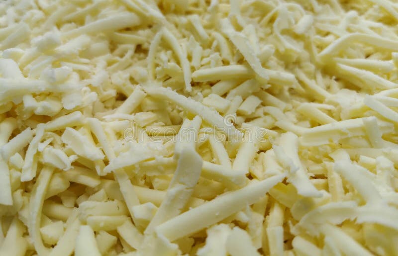 Shredded Cheese Background.Heap of Grated Pizza Cheese Close Up Texture ...