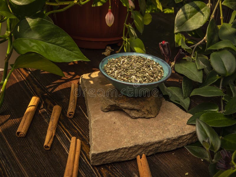 Shredded Herbal Tea. in a Turquoise Small Plate on a Stone. Cinnamon ...