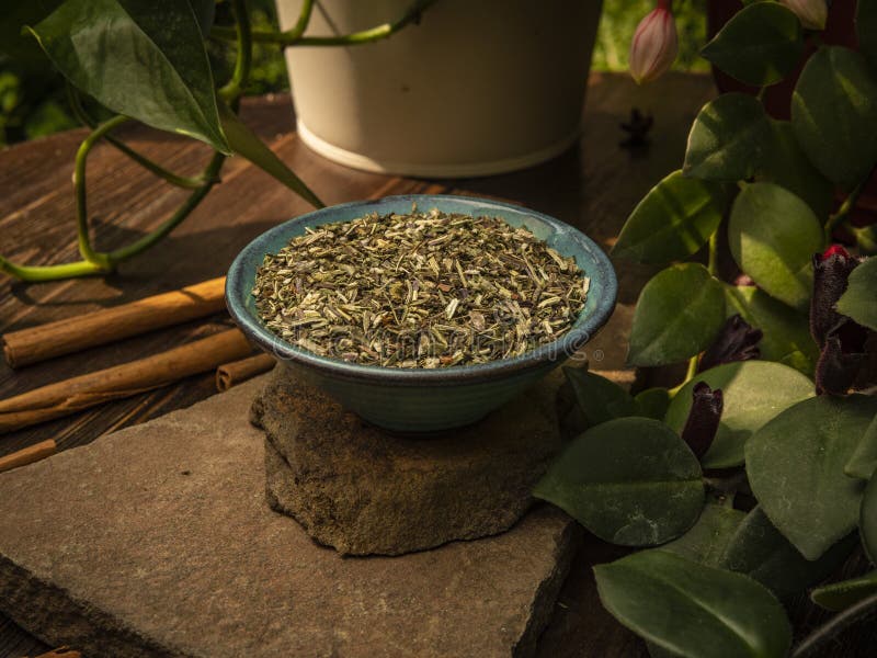 Shredded Herbal Tea. in a Turquoise Small Plate on a Stone. Cinnamon ...