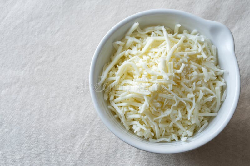Shredded Mozzarella Chees in a Bowl Stock Image - Image of macro ...