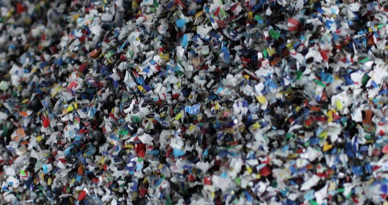 Shredded Multi-colored Plastic. Close-up. Waste Recycling Stage. the ...