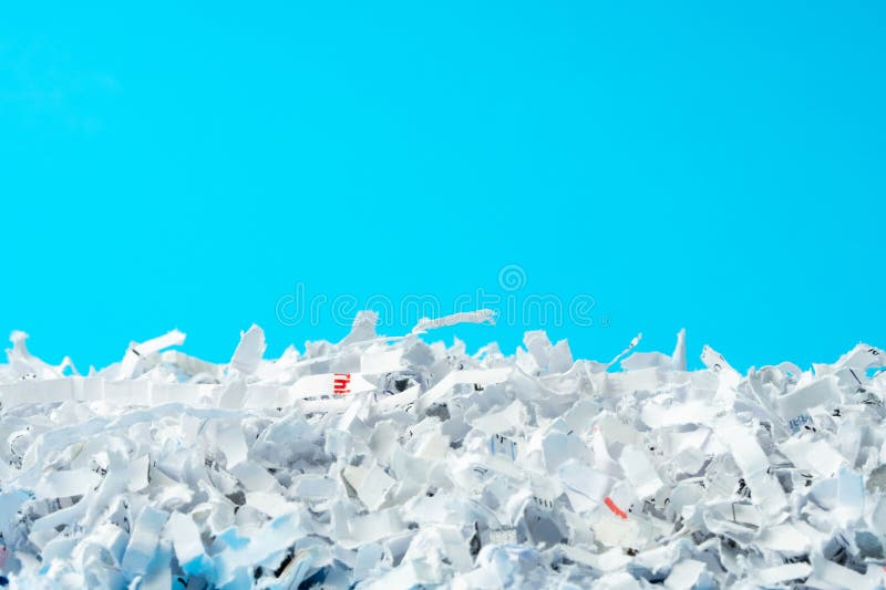 Shredded Paper Pieces on a Blue Background Stock Photo - Image of paper ...