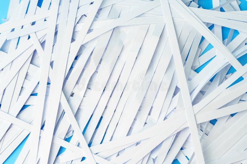 Shredded Paper Pieces on a Blue Background Stock Photo - Image of shred ...