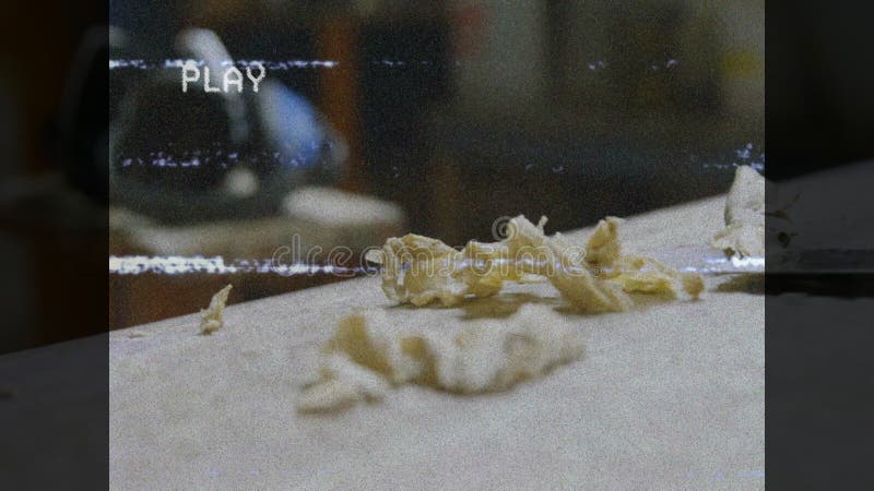 Shredded Paper on Table with Animation of Static Lines and PLAY Text ...