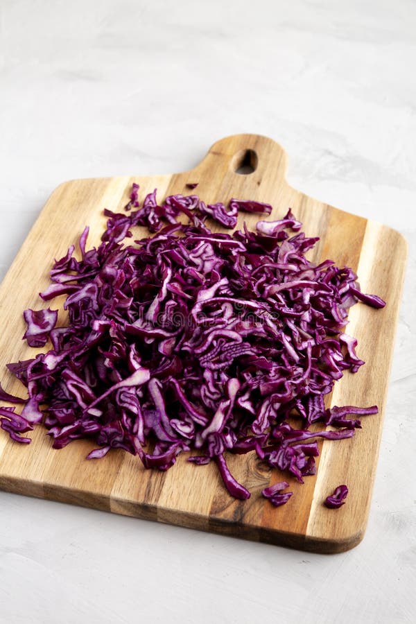 Shredded Purple Cabbage on a Board, Side View Stock Photo - Image of ...