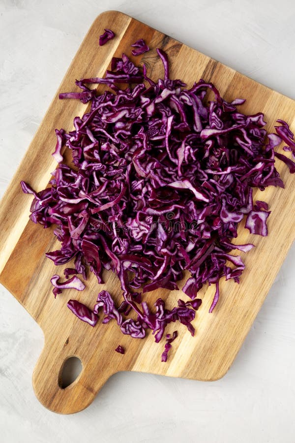 Shredded Purple Cabbage on a Board, Top View. Flat Lay, Overhead, from ...