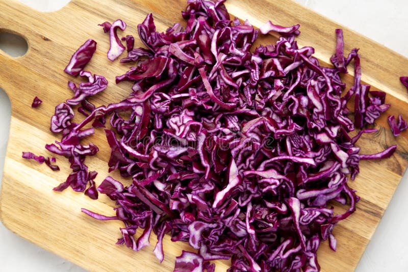 Shredded Purple Cabbage on a Board, Top View. Flat Lay, Overhead, from ...