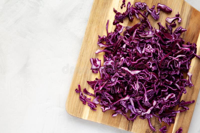 Shredded Purple Cabbage on a Board, Top View. Flat Lay, Overhead, from ...