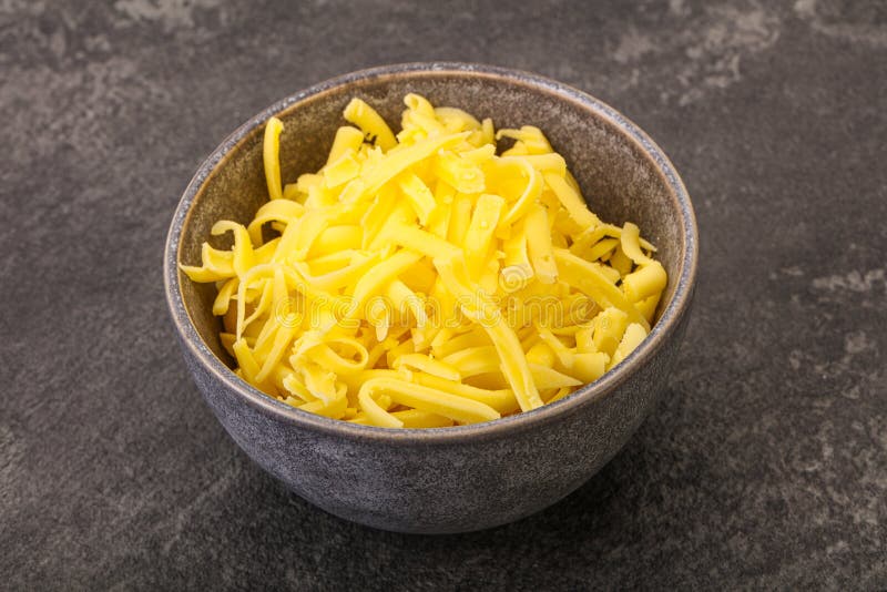 Shredded Yellow Cheese in the Bowl Stock Image - Image of isolated ...