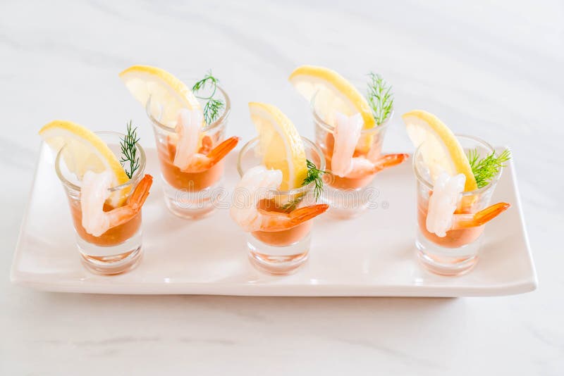 Shrimp cocktail with sauce stock photo. Image of food - 130251746