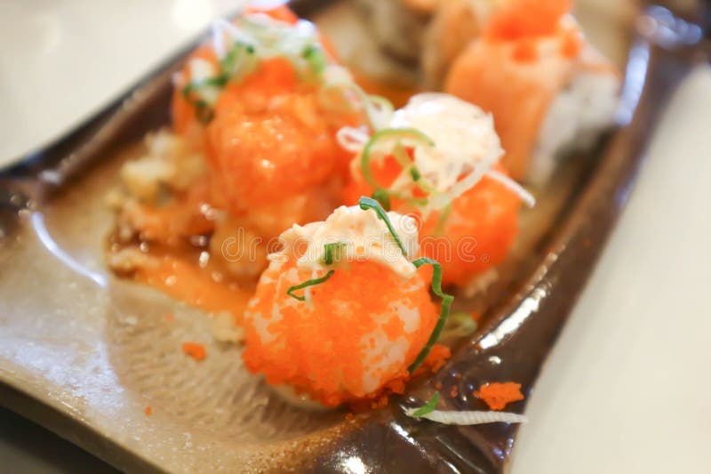 Shrimp Egg Rolls or Rice Topped with Fish or Japanese Rolls Stock Photo ...