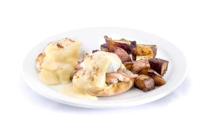 Shrimp Eggs Benedict with Hash Browns Stock Photo - Image of delicious ...