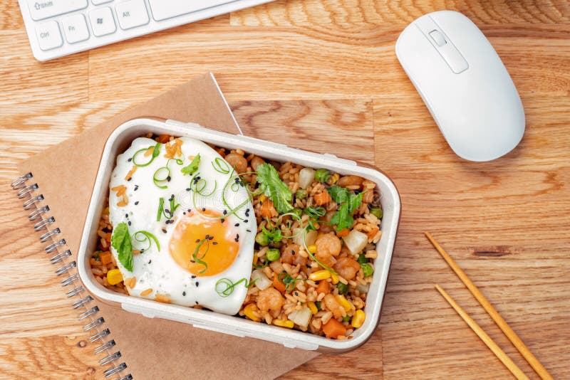 Shrimp Fried Rice with Vegetables and Egg in a Lunch Box Stock Photo ...
