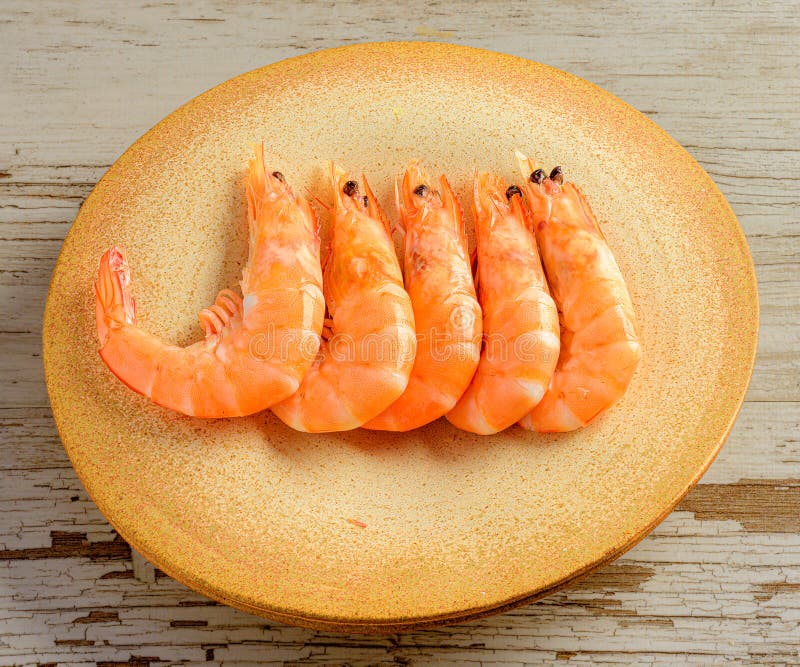 Shrimp on a Plate with a Small Brown Spot Stock Photo - Image of ...