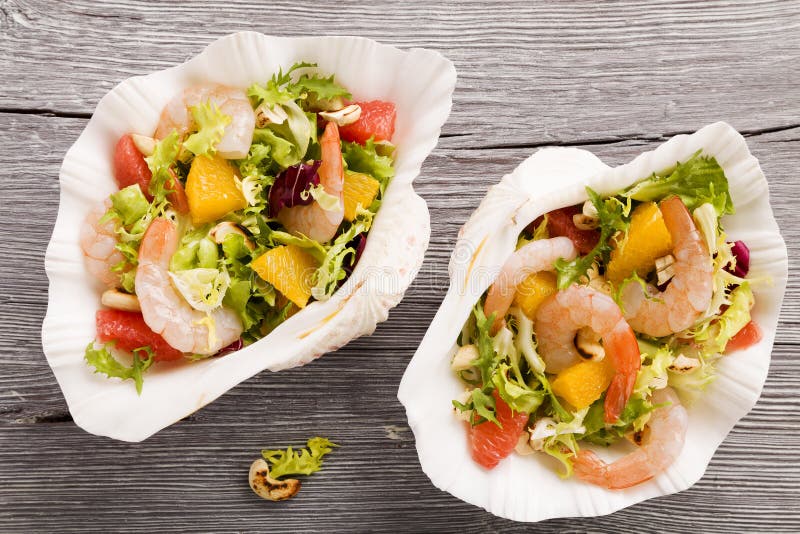 Shrimp salad in sea shells stock photo. Image of shrimps - 190666780