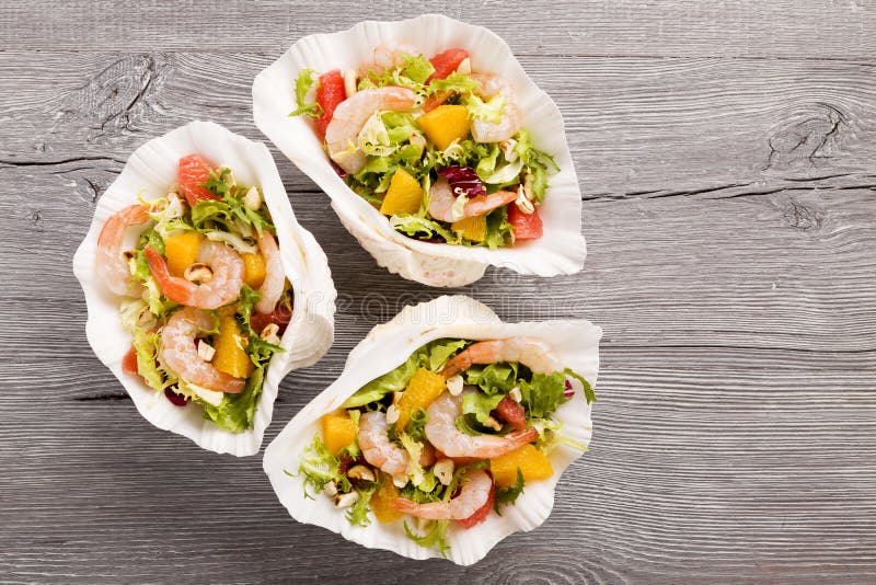 Shrimp salad in sea shells stock image. Image of healthy - 190668751