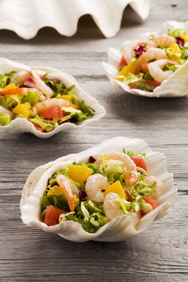 Shrimp salad in sea shells stock photo. Image of restaurant - 190668800