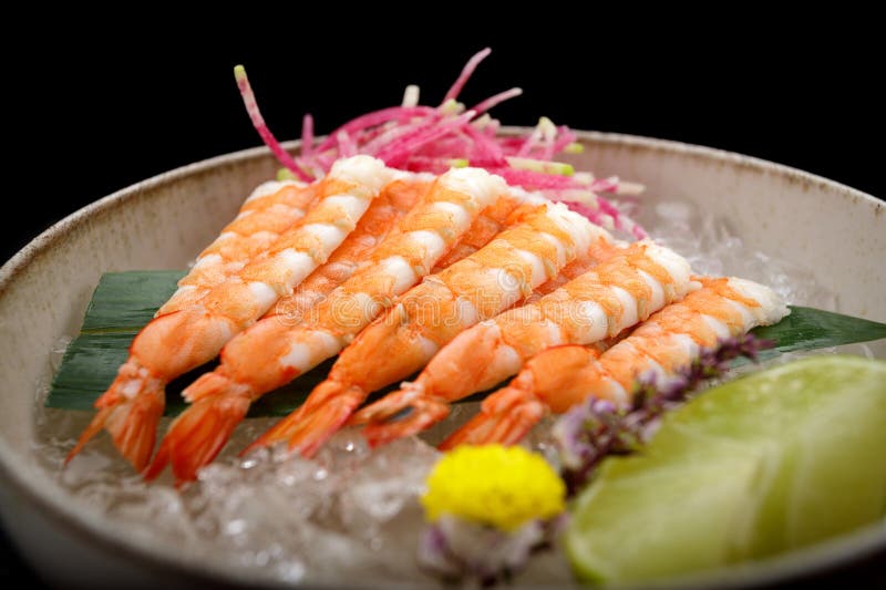 Shrimp Sashimi with Lime and Ice on a Bamboo Leaf Stock Image - Image ...