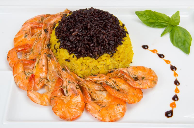 Shrimp with Yellow Rice and Black Stock Photo - Image of plate, diet ...