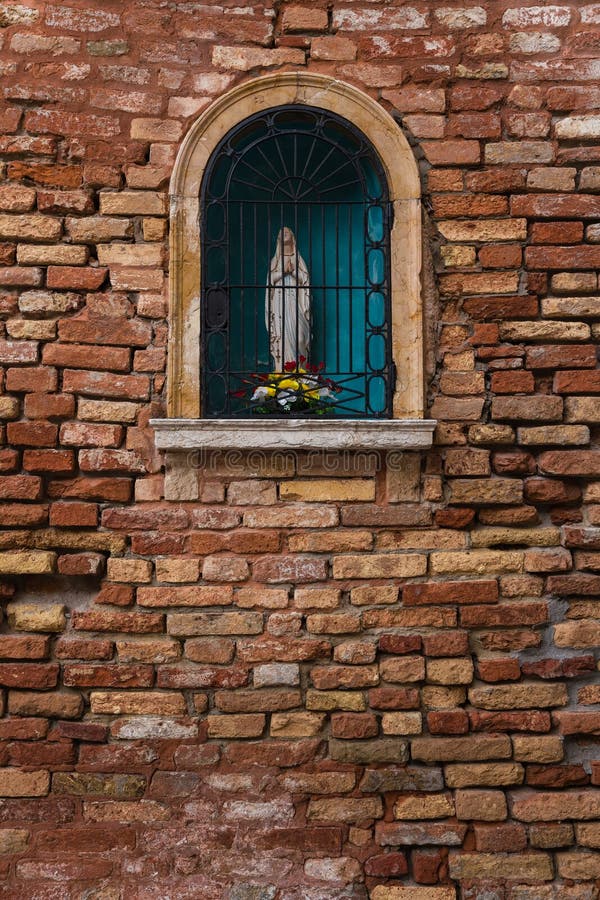 Shrine of the Virgin Mary in an Old Brick Wall. Stock Photo - Image of ...