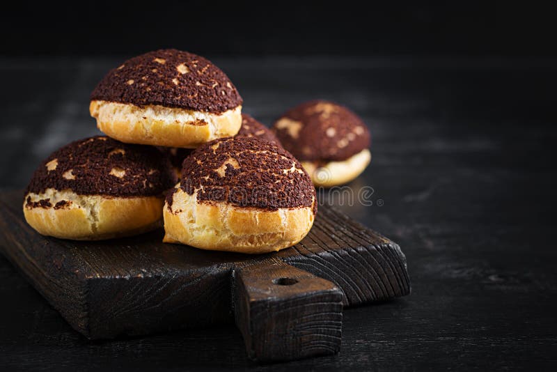 Shu Cake. Tasty Profiterole with Cream on the Plate Stock Image - Image ...