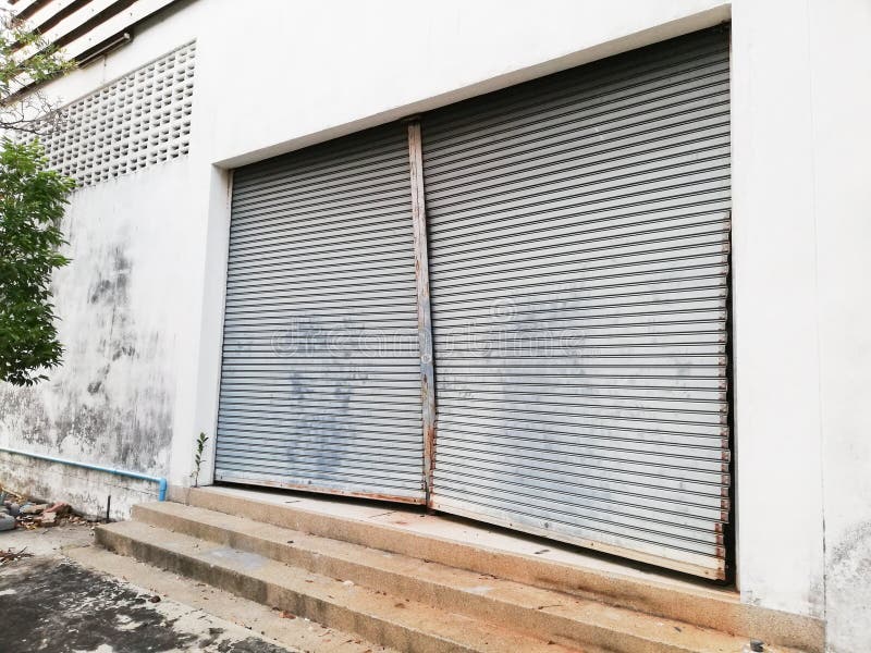 Shutter door stock photo. Image of gate, door, damage - 141833520